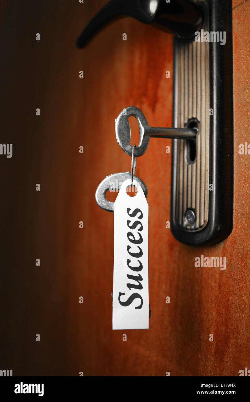 The Key Of Success To Open The Success Door Stock Photo - Alamy
