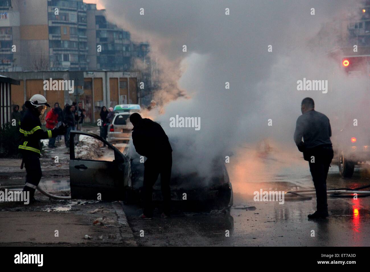 Bulgarian firefighters work hard to put out a massive fire from a ...