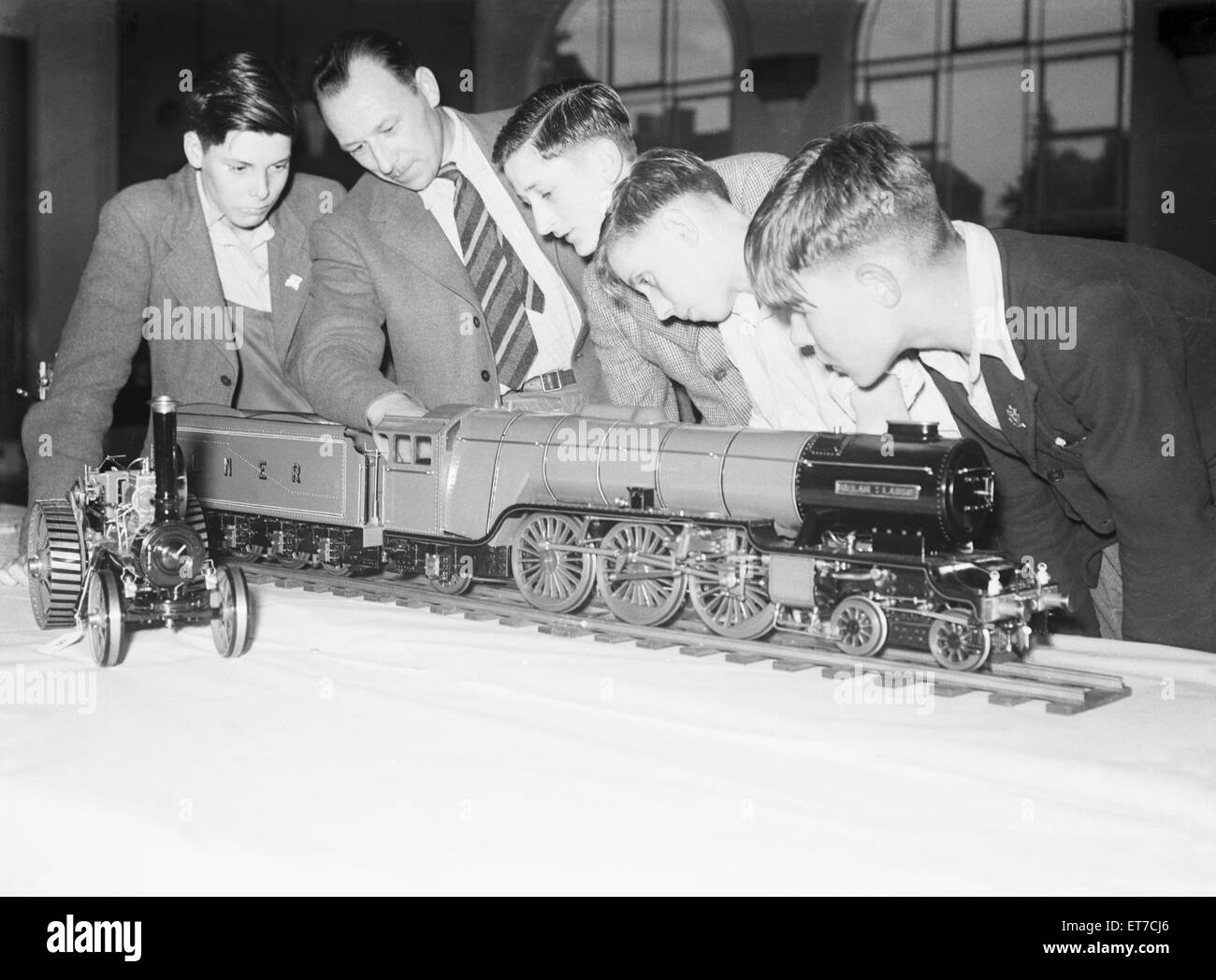 A group of Coventry school boys inspect a model of a LNER A1 steam ...