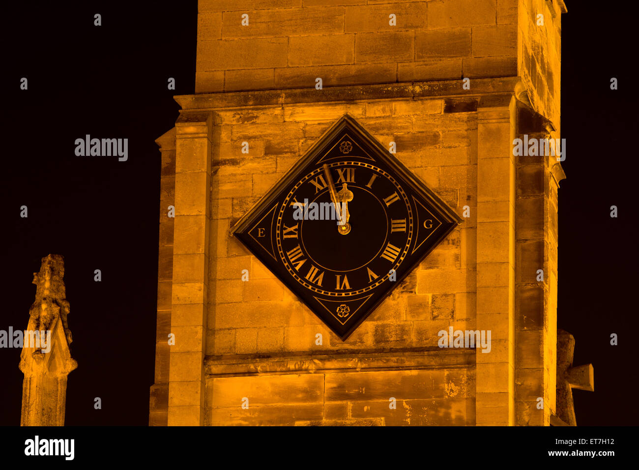 A clock just before midnight Stock Photo - Alamy