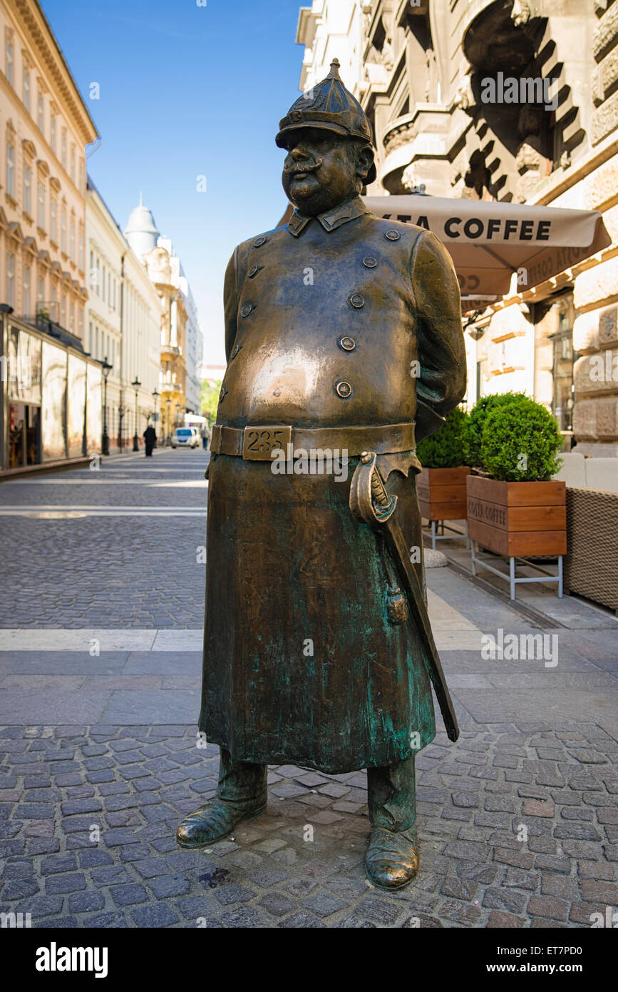 Statue of fat policeman, Budapest, Hungary Stock Photo - Alamy
