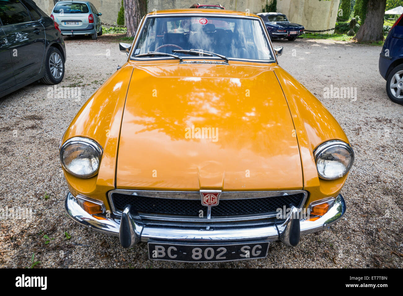 yellow MG sports car Stock Photo - Alamy