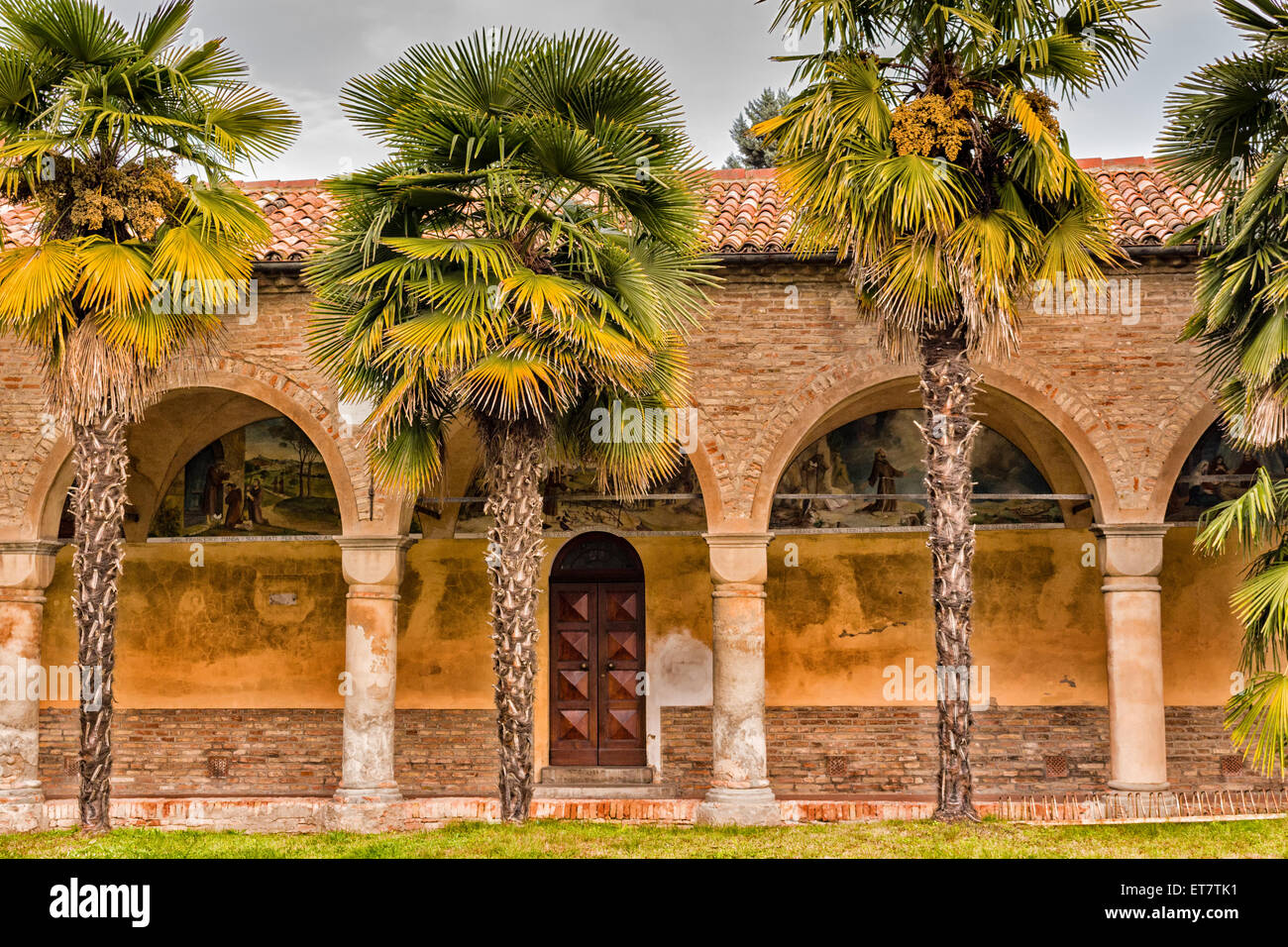 Archs and columns of Italian cloister of the XV century roman gothic ...