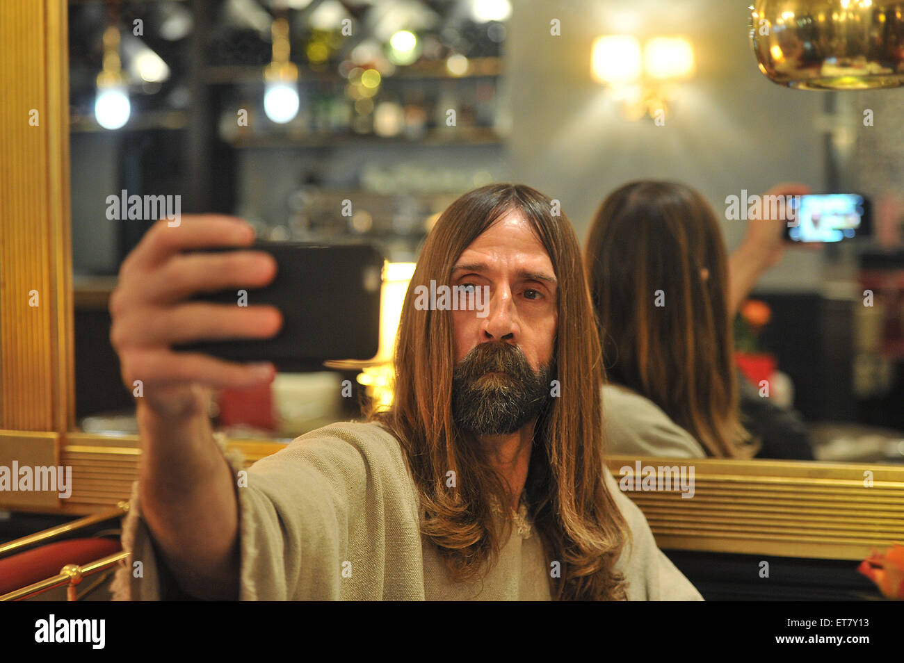 Nigel Farage is met by Kevin Lee Light, aka Jesus of Hollywood, as he ...