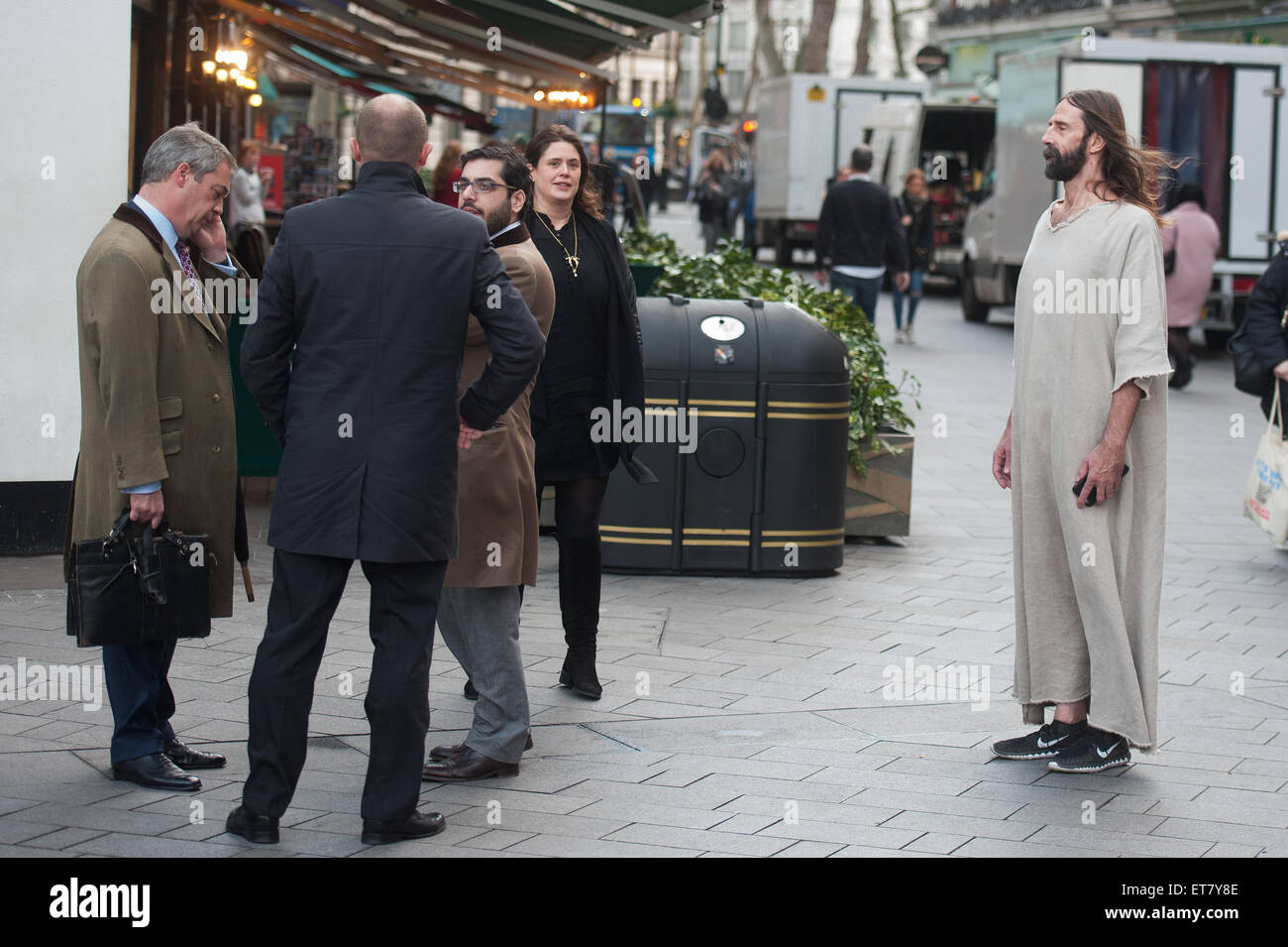 Nigel Farage is met by Kevin Lee Light, aka Jesus of Hollywood, as he ...
