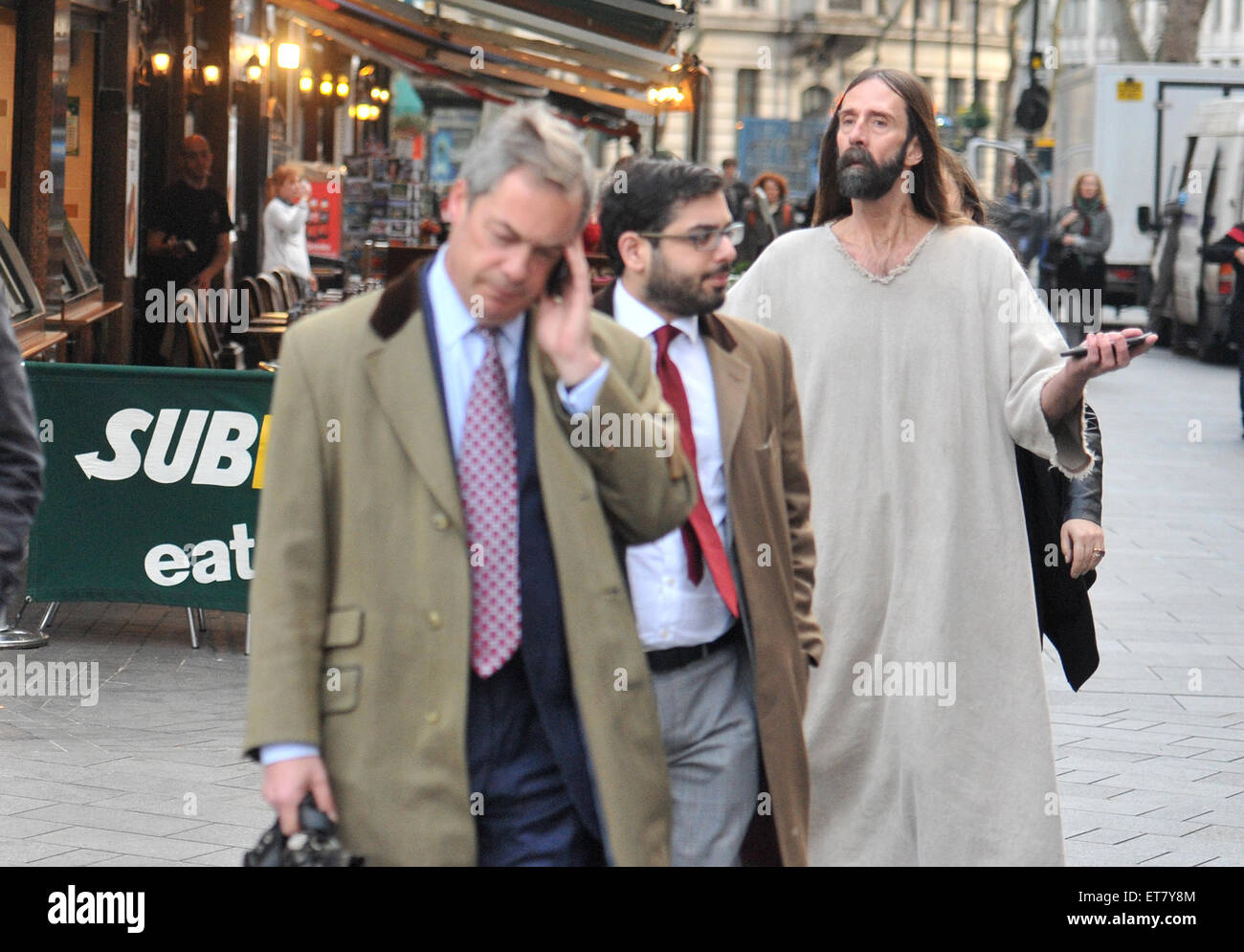 Nigel Farage is met by Kevin Lee Light, aka Jesus of Hollywood, as he ...