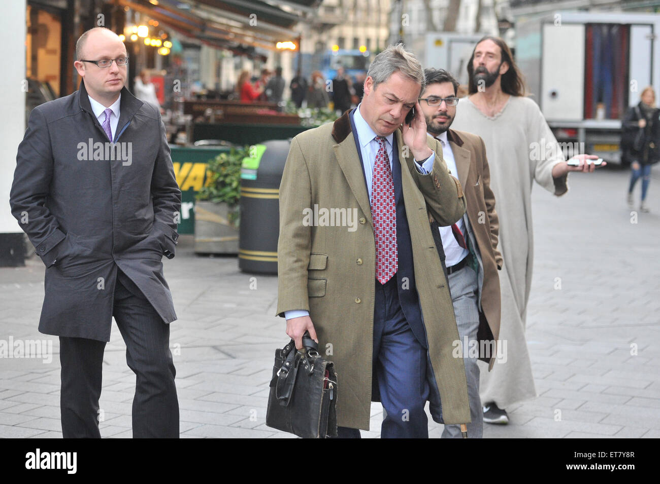 Nigel Farage is met by Kevin Lee Light, aka Jesus of Hollywood, as he ...