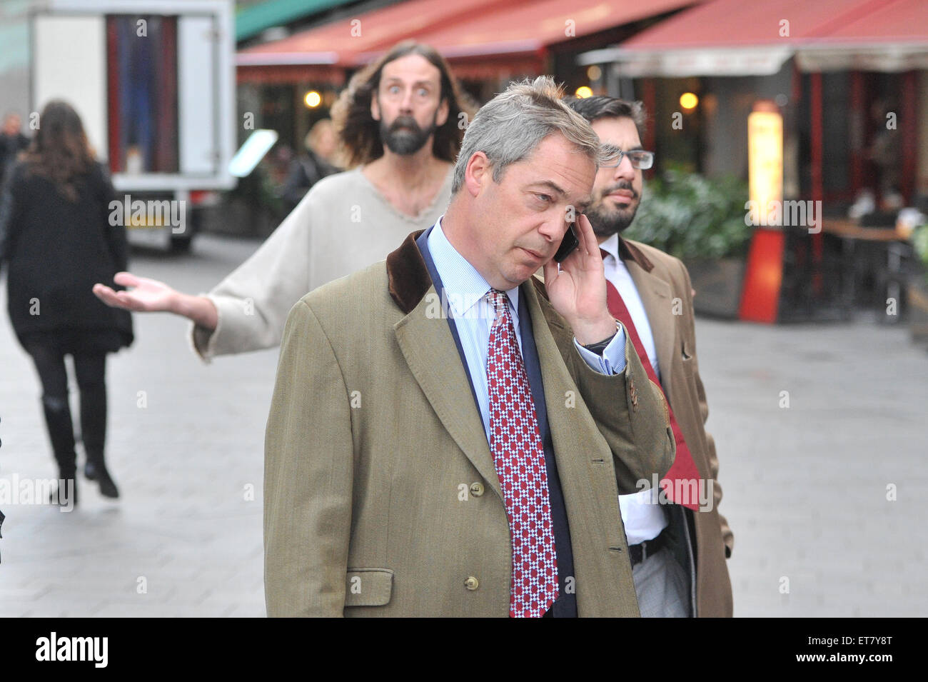 Nigel Farage is met by Kevin Lee Light, aka Jesus of Hollywood, as he ...