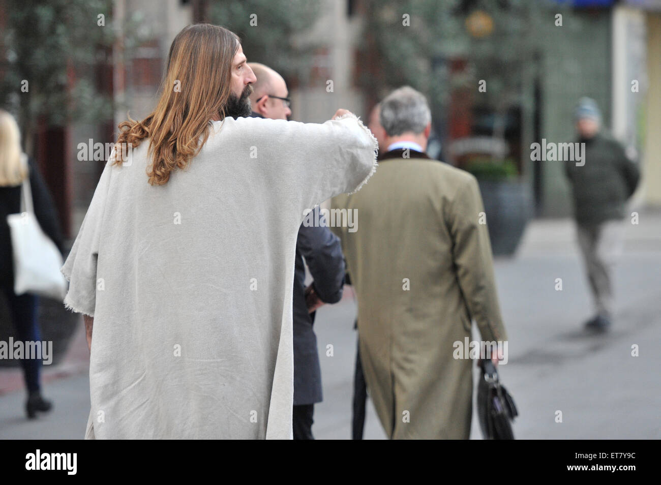 Nigel Farage is met by Kevin Lee Light, aka Jesus of Hollywood, as he ...