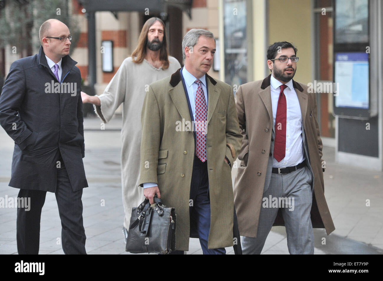 Nigel Farage is met by Kevin Lee Light, aka Jesus of Hollywood, as he ...