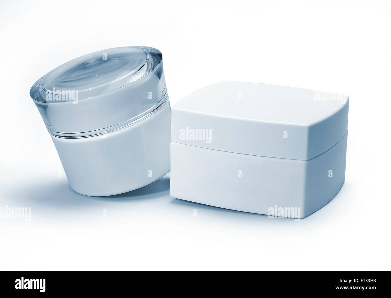 Two cosmetics containers. Blue tone Stock Photo - Alamy