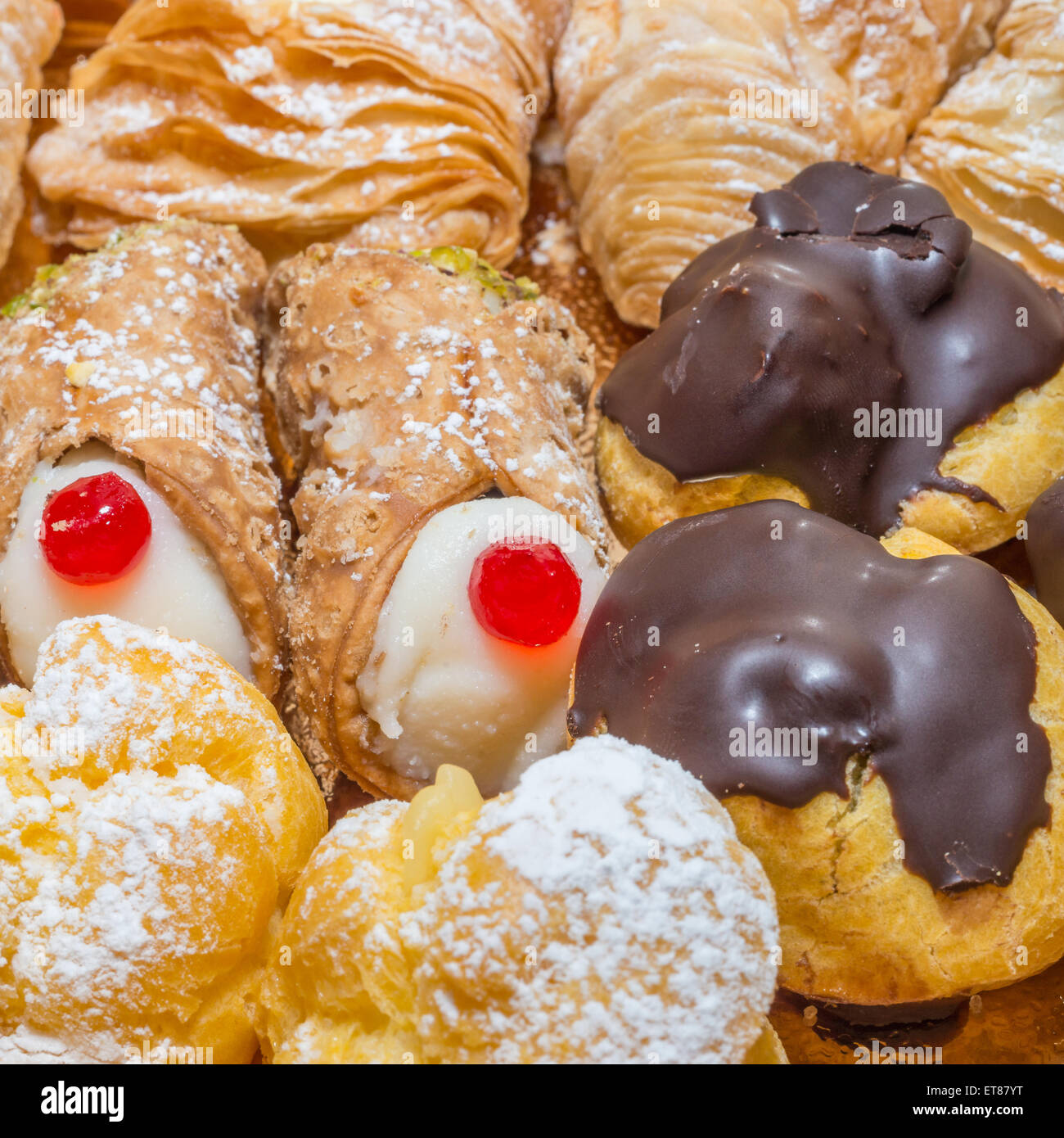 colorful pastries with fruits, cream and chocolate, the real Italian ...