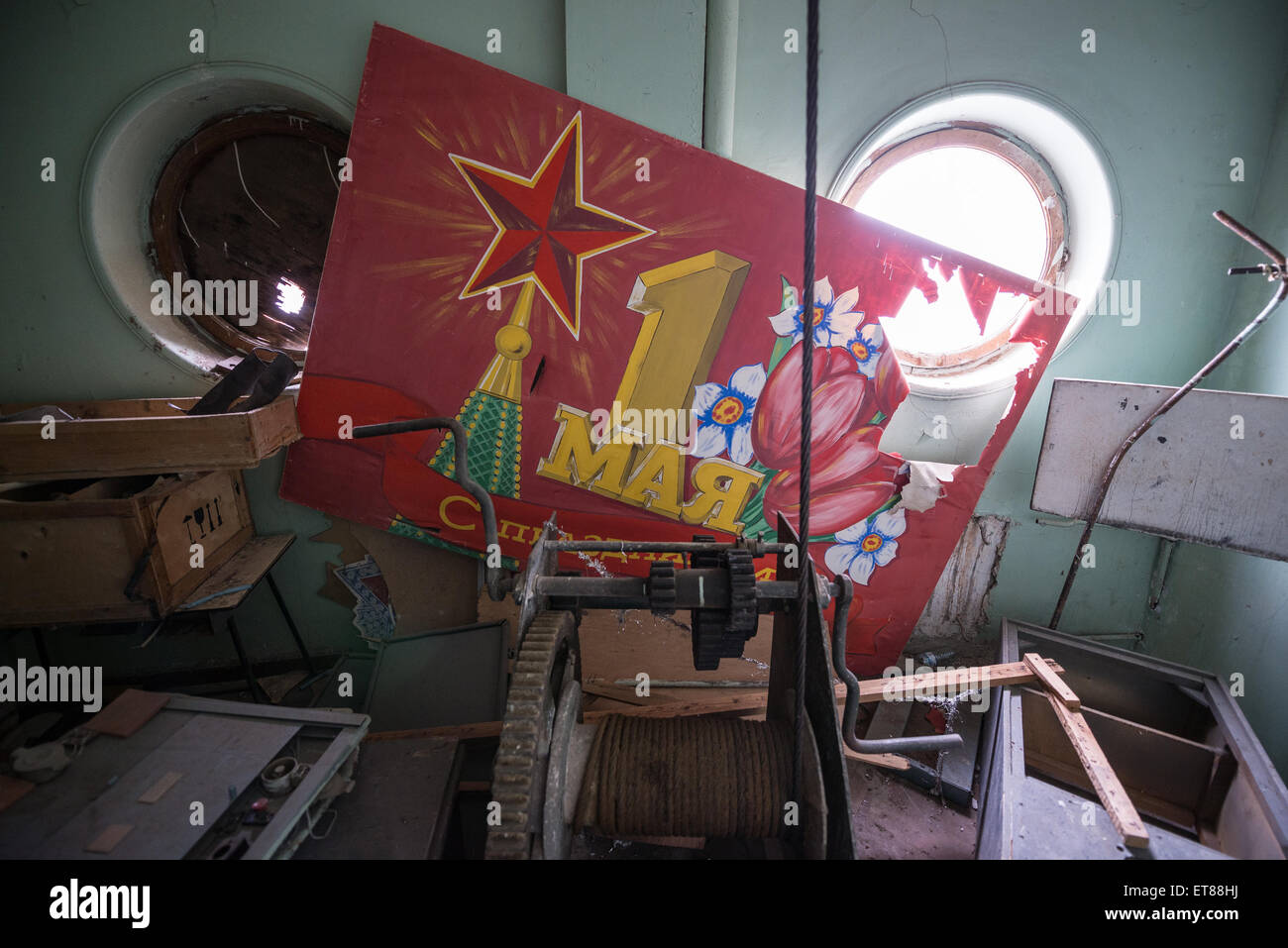 Old soviet Labour Day poster in closed part of Tskaltubo Spa Resort ...