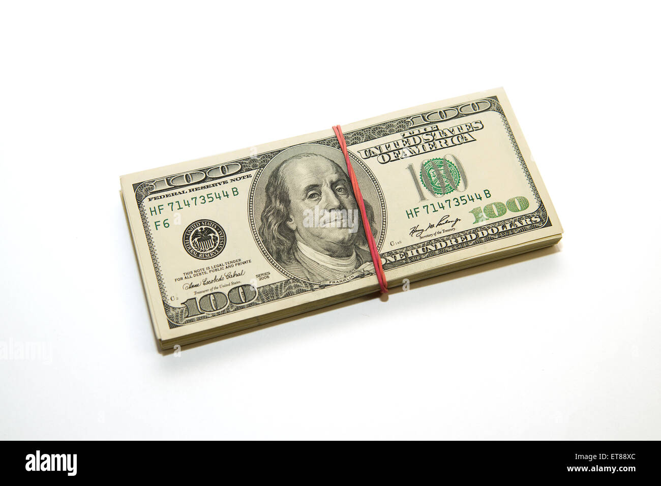 One pack of US dollars banknotes on a white background Stock Photo - Alamy