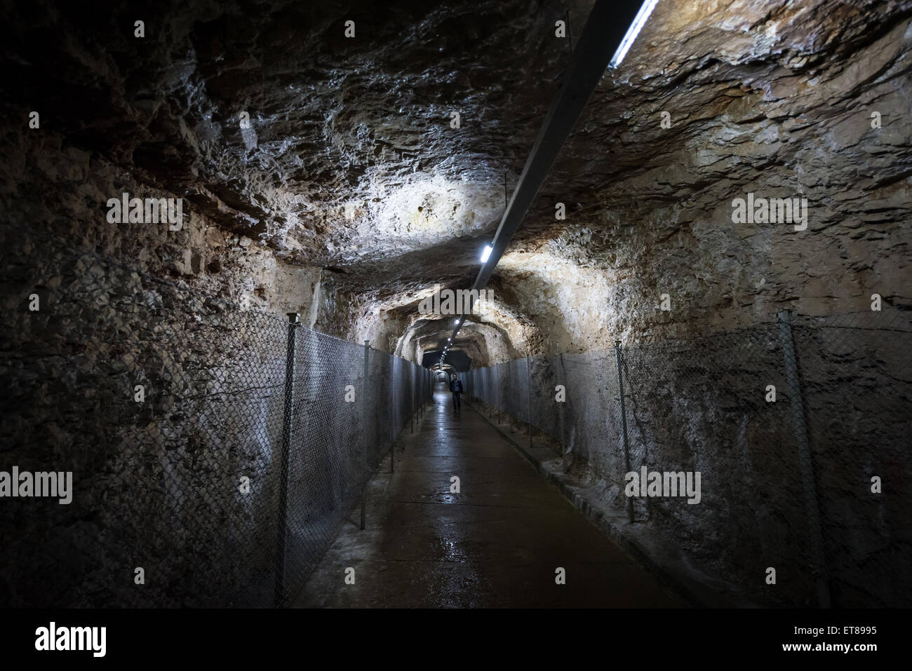 Long corridor leading to exit from Tskaltubo Cave also called ...