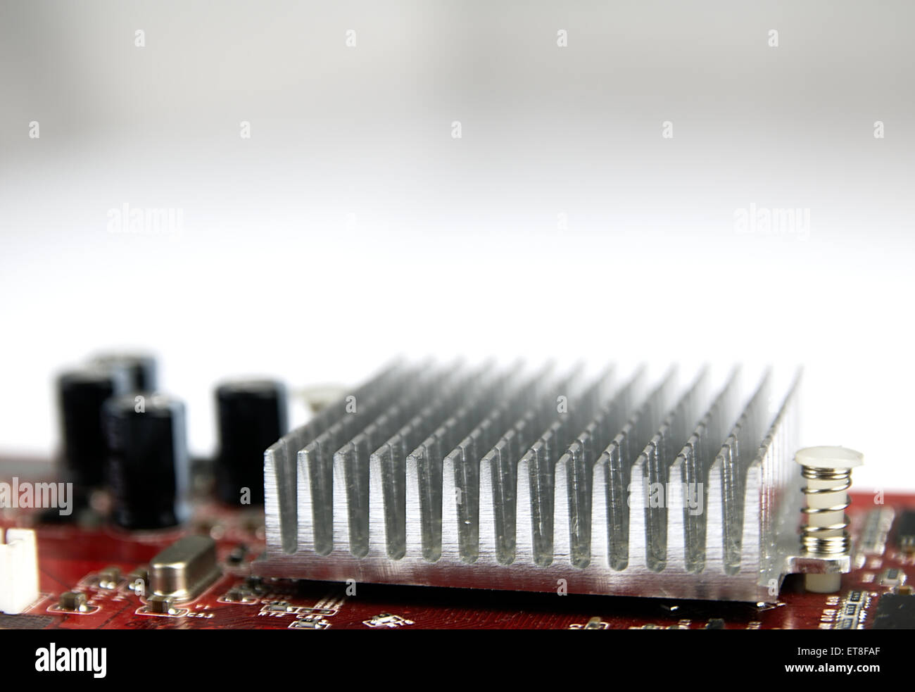 Radiator, silver and aluminum. On the motherboard with visible ...