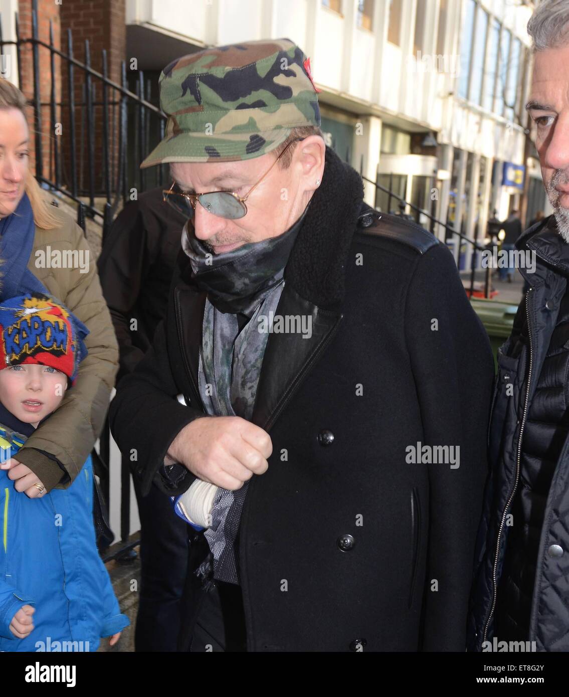With his injured arm in a sling, Bono avoided the annual charity ...