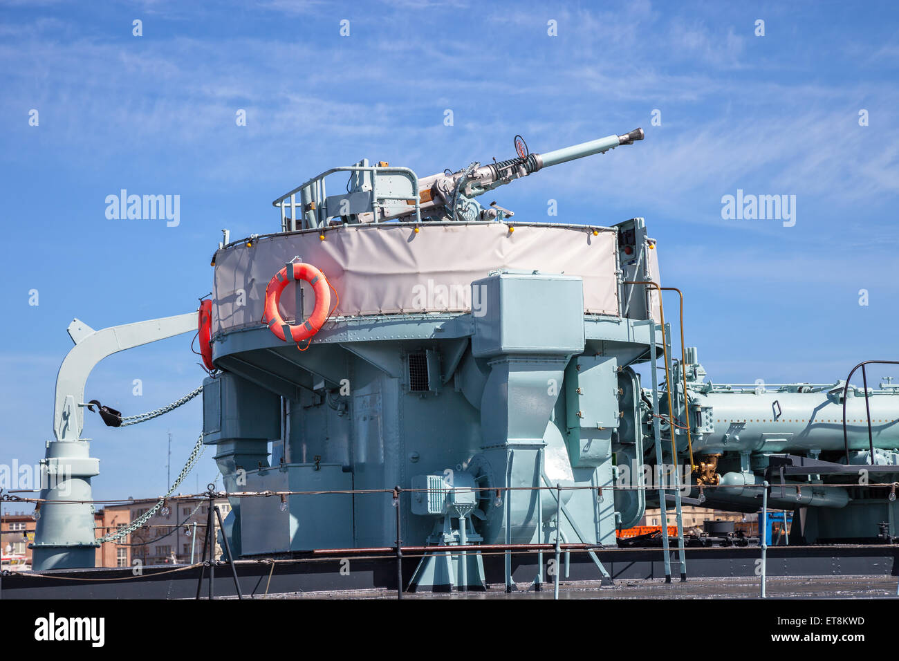 Gun turret on a naval warship over blue sky Stock Photo - Alamy