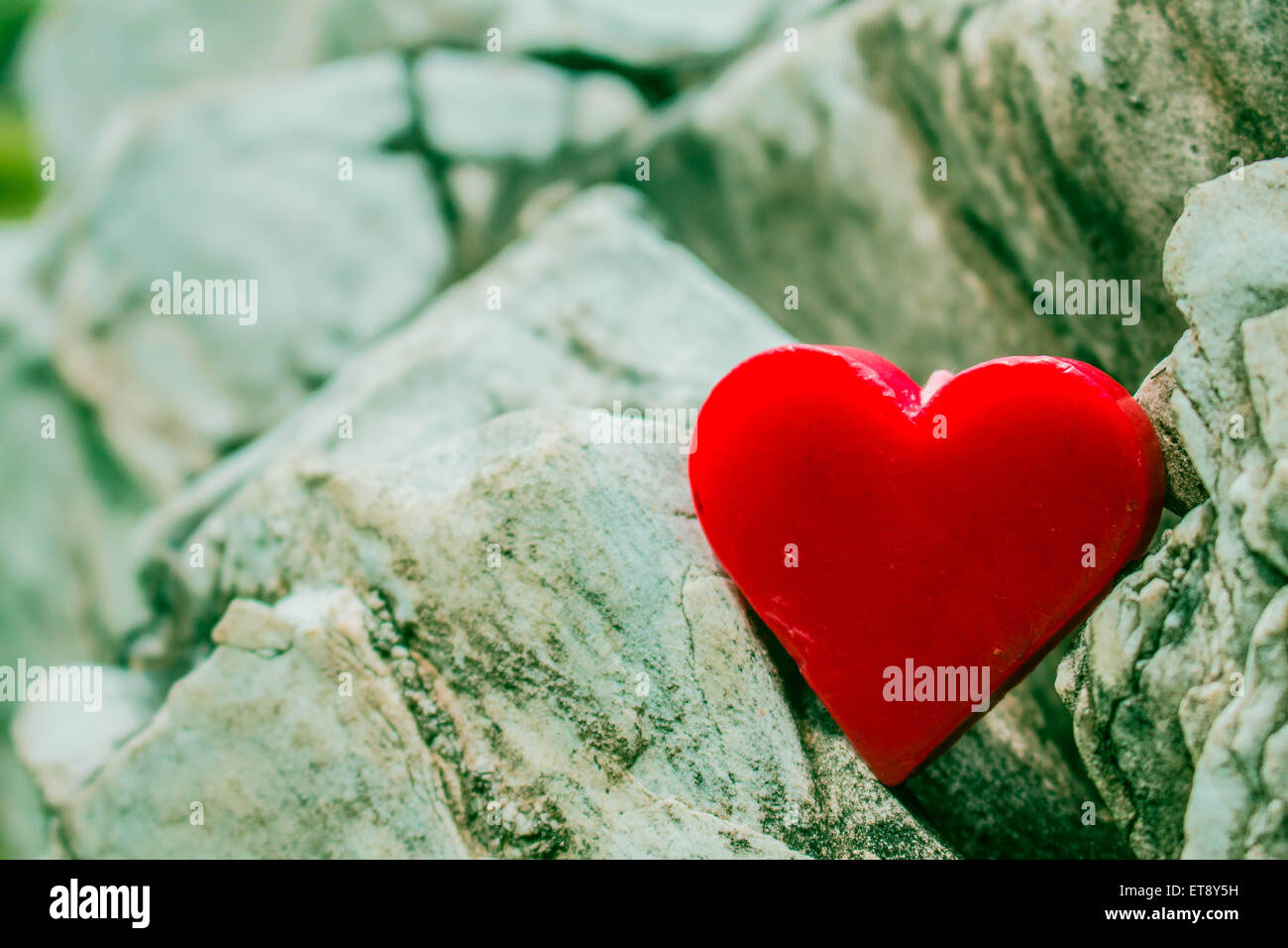 Red heart shapes in the rocks Stock Photo - Alamy