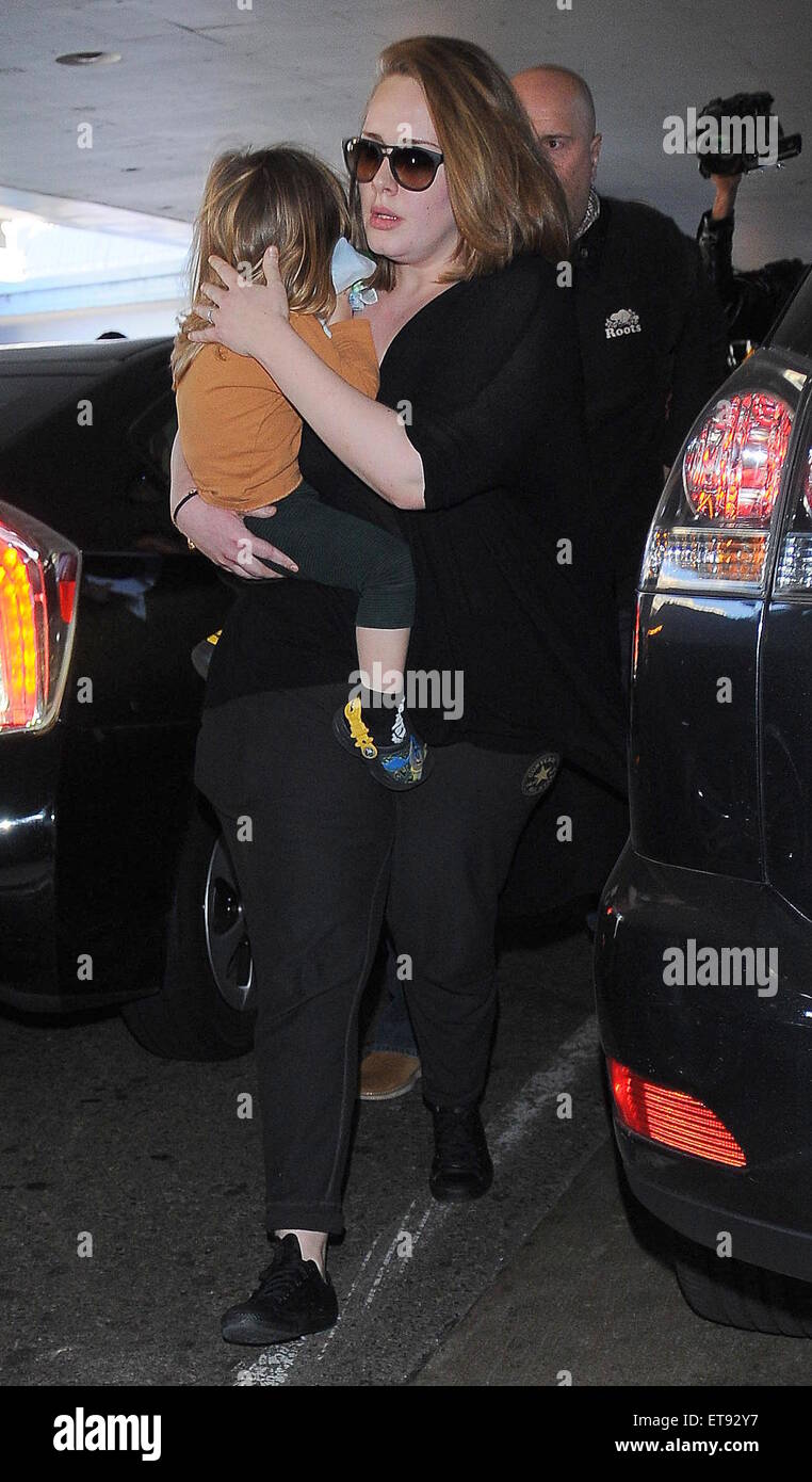 Adele arrives at Los Angeles International (LAX) airport carrying her son Angelo Featuring ...