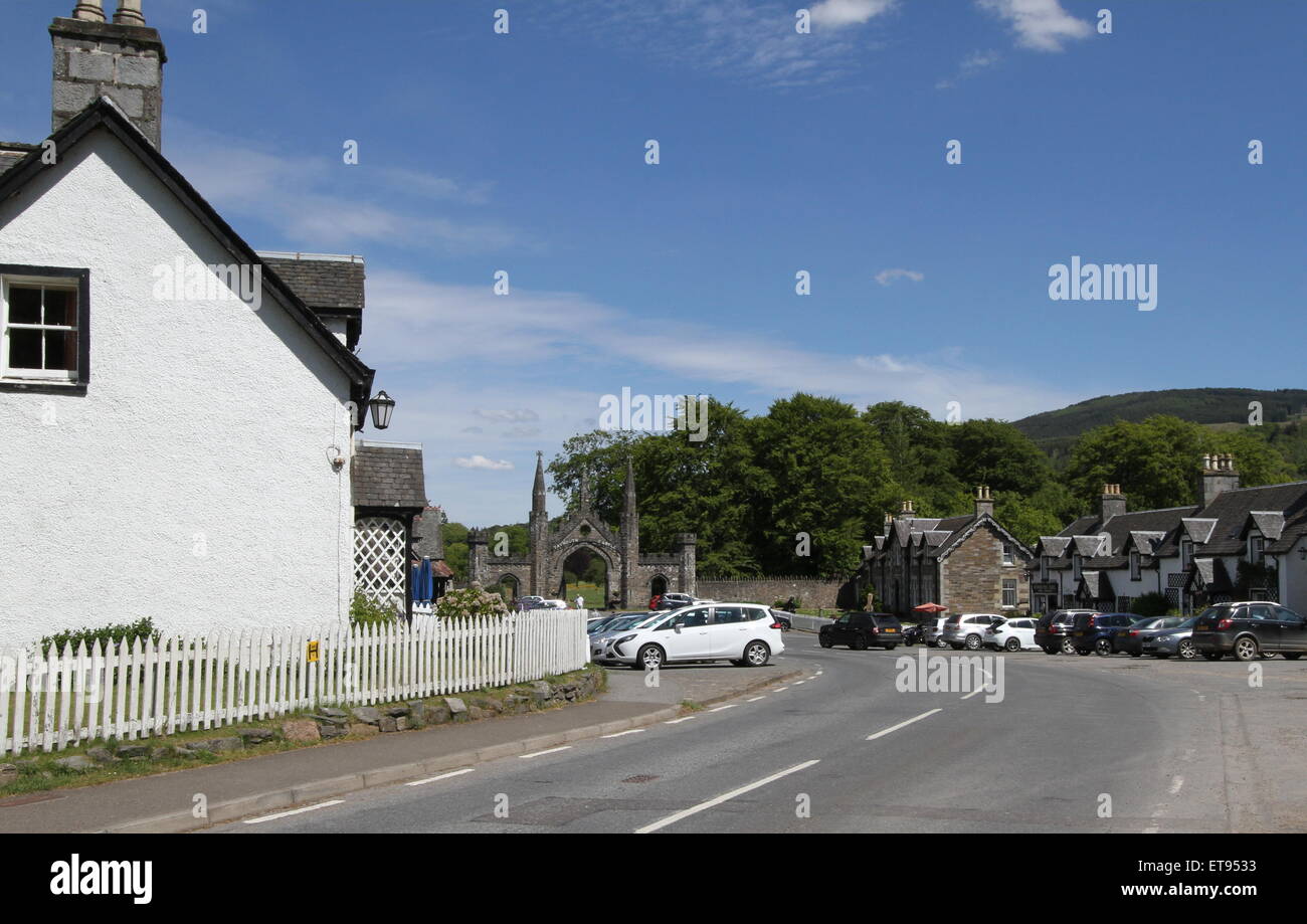 Kenmore street scene with Taymouth Estate Gateway and hotel Scotland ...