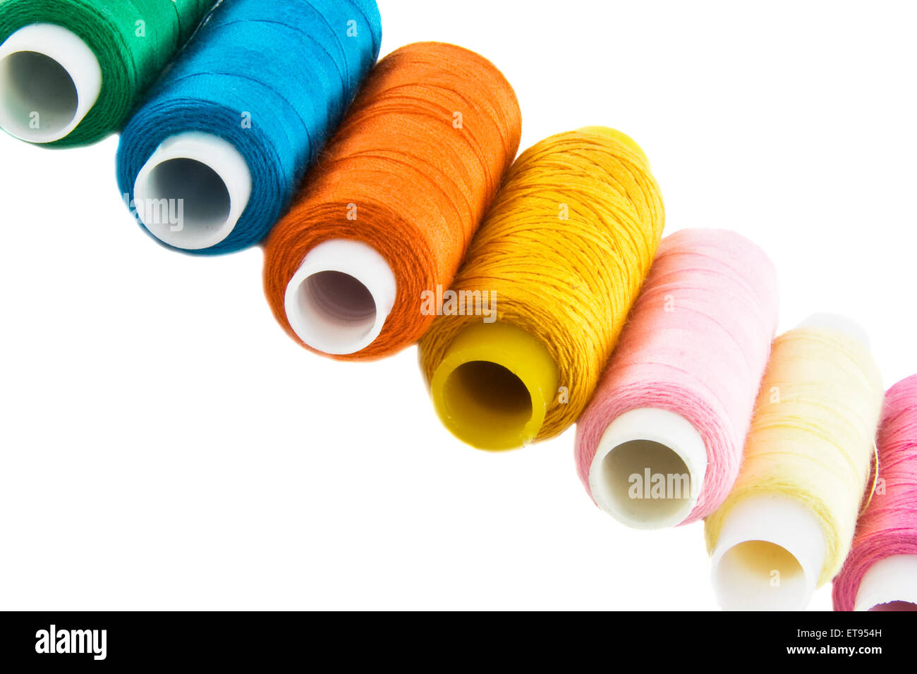 Many colorful threads over the white background Stock Photo - Alamy
