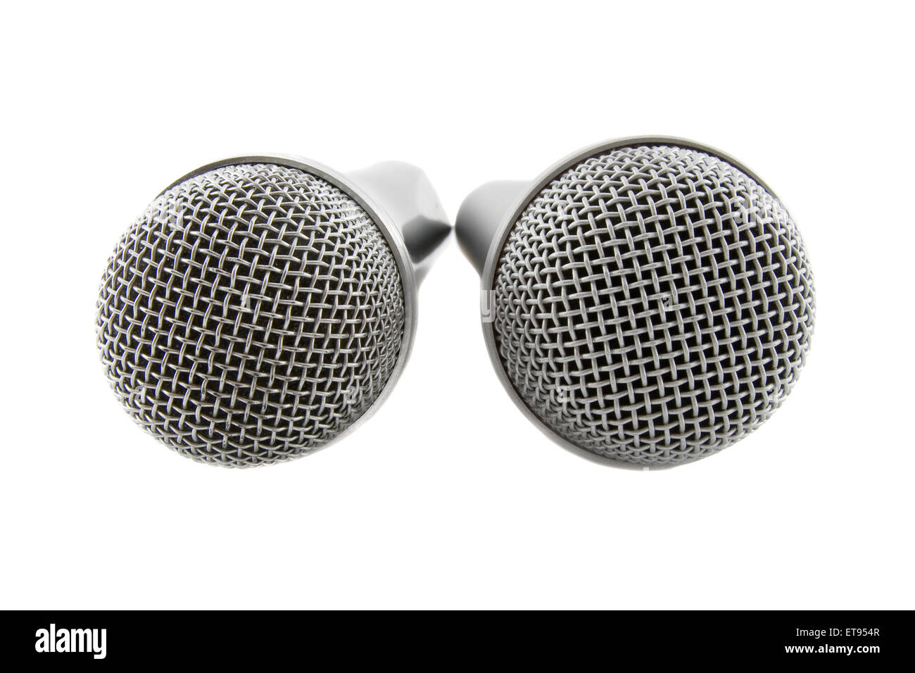 Two silver microphones isolated over white background Stock Photo - Alamy