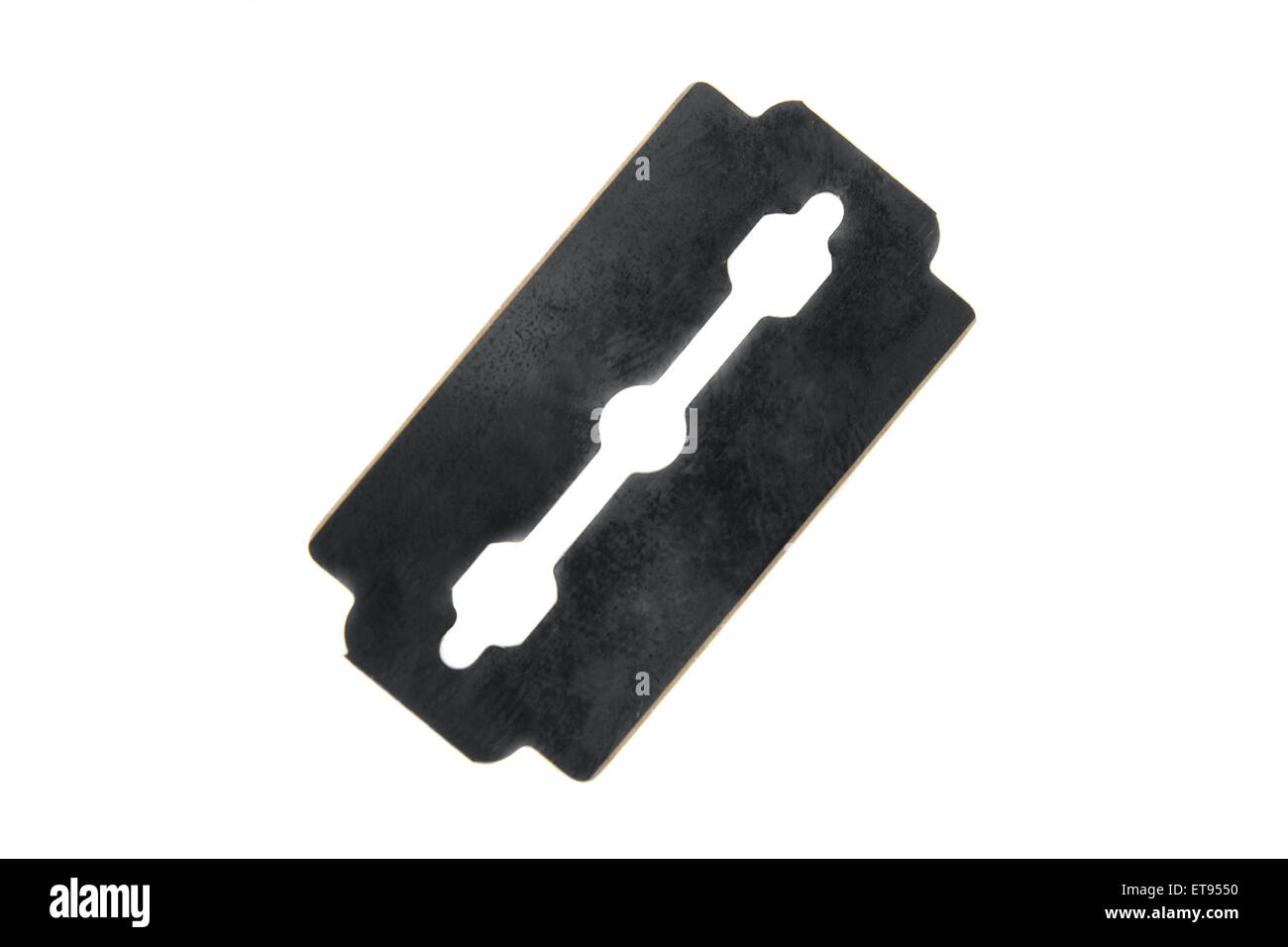 Macro of razor blade isolated on white background Stock Photo - Alamy