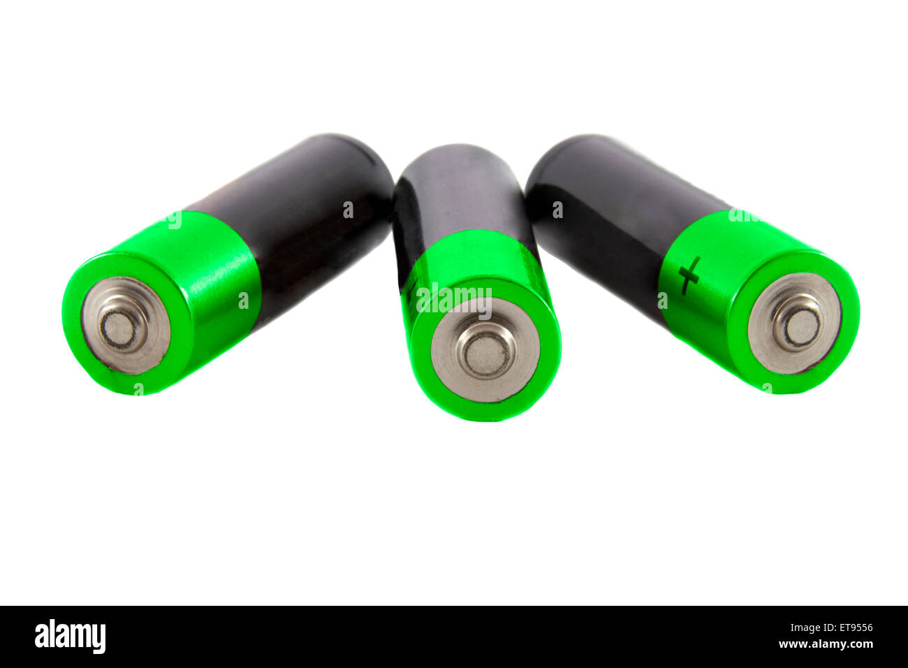 Three green batteries isolated over white background Stock Photo - Alamy