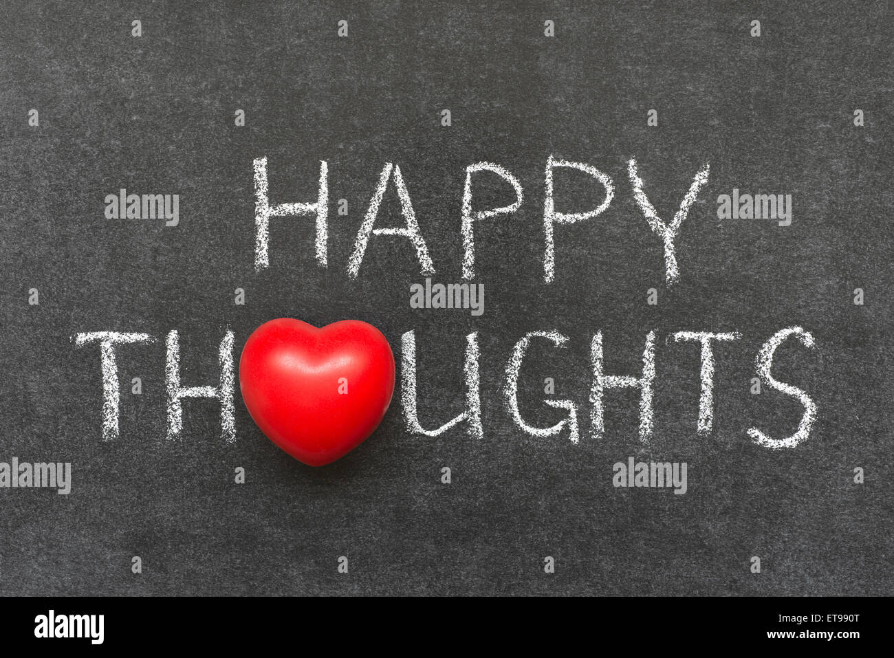 happy thoughts phrase handwritten on blackboard with heart symbol ...