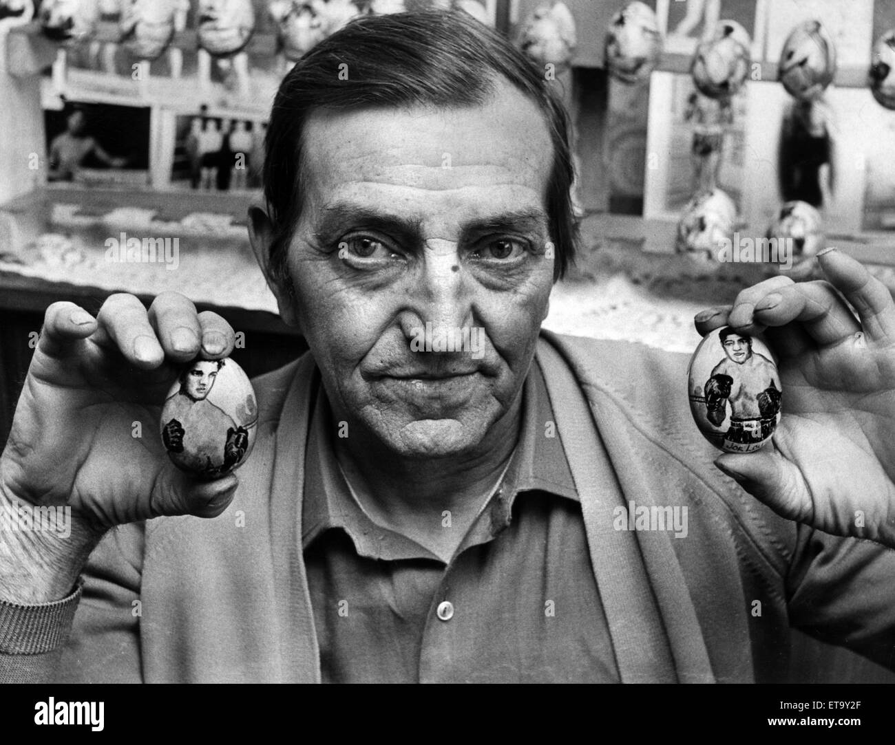 Egg man, Jack Craig, holds up two of his portraits of former ...