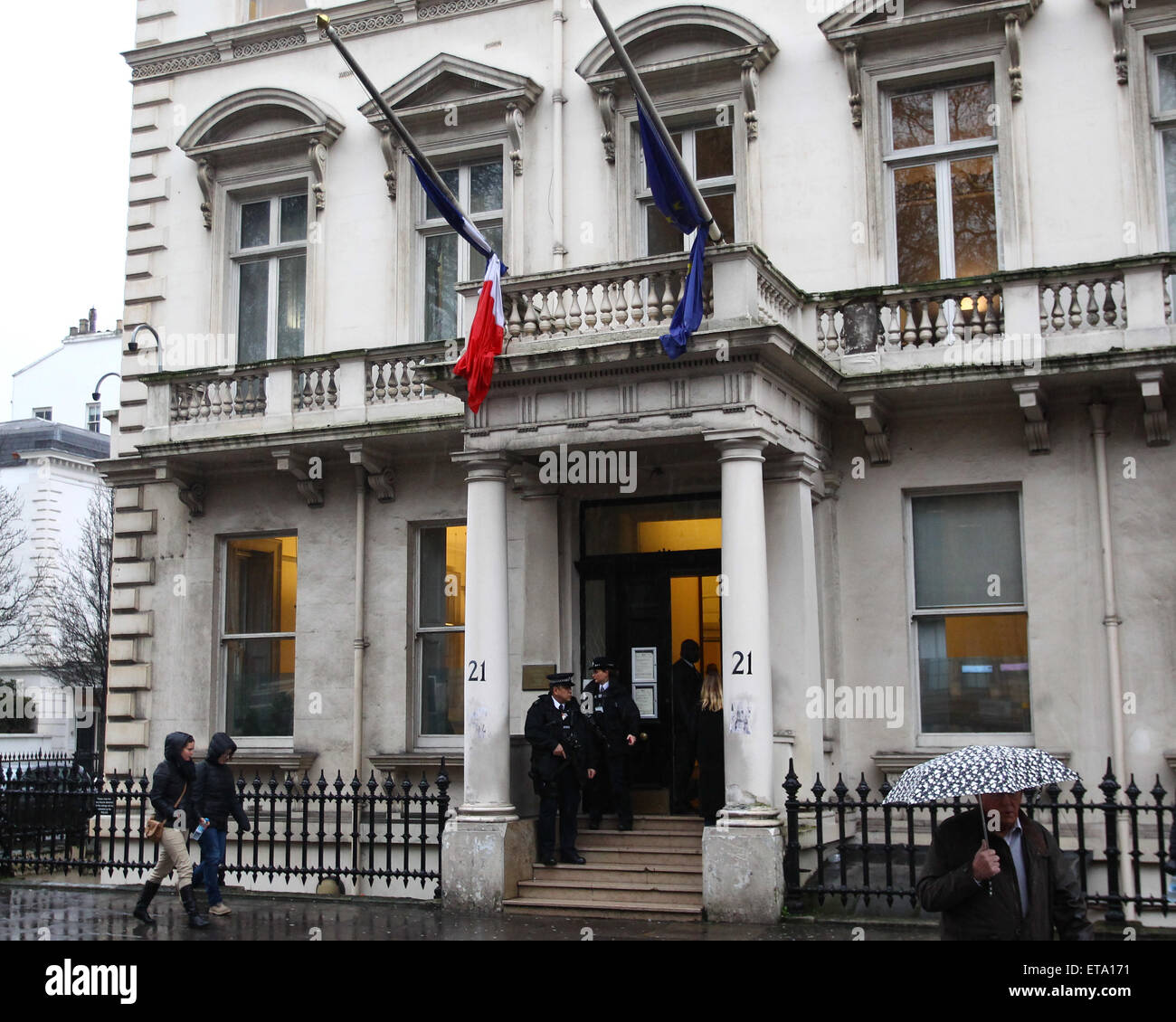Armed police stand guard outside the French Consular section and the ...