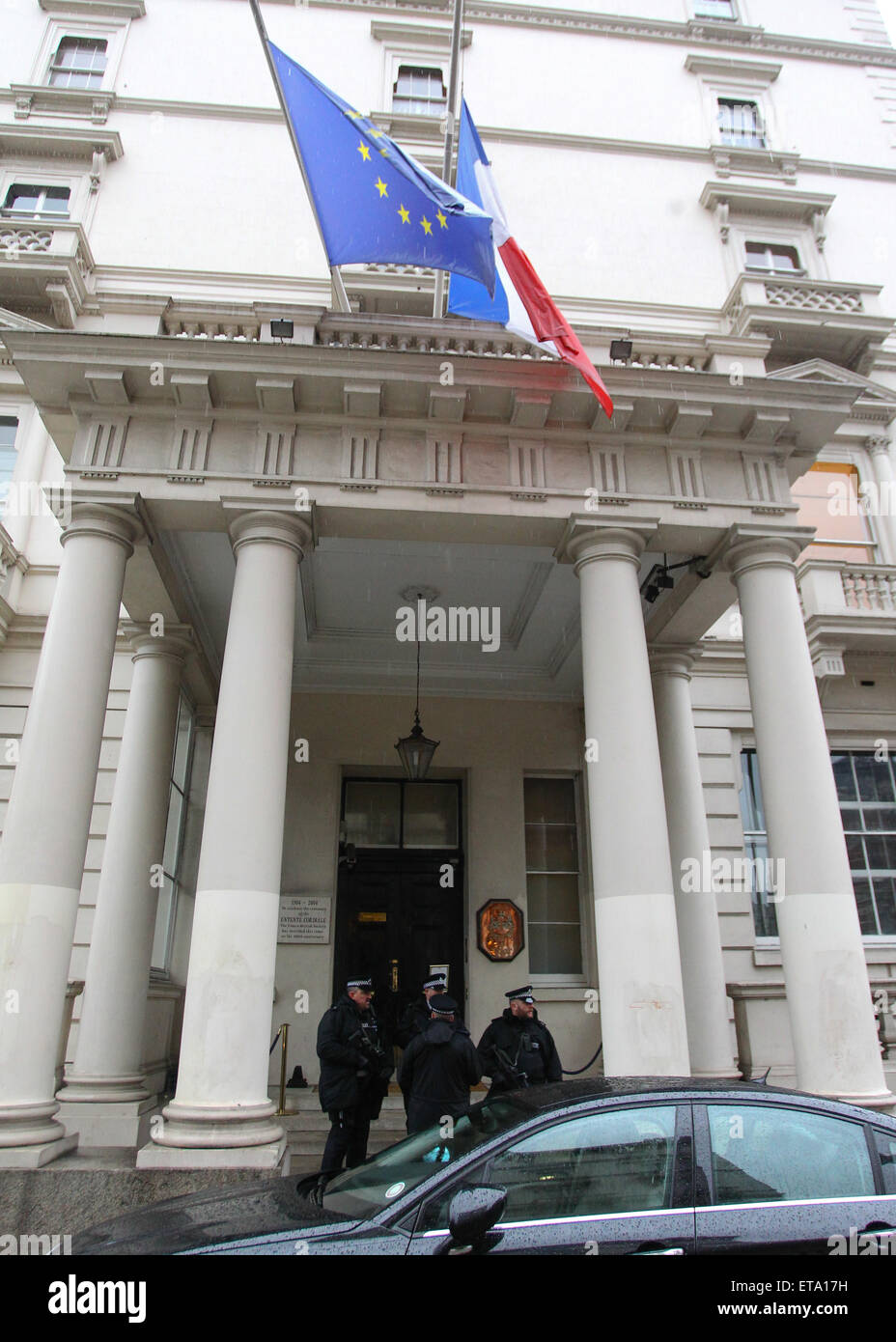 Armed police stand guard outside the French Consular section and the ...