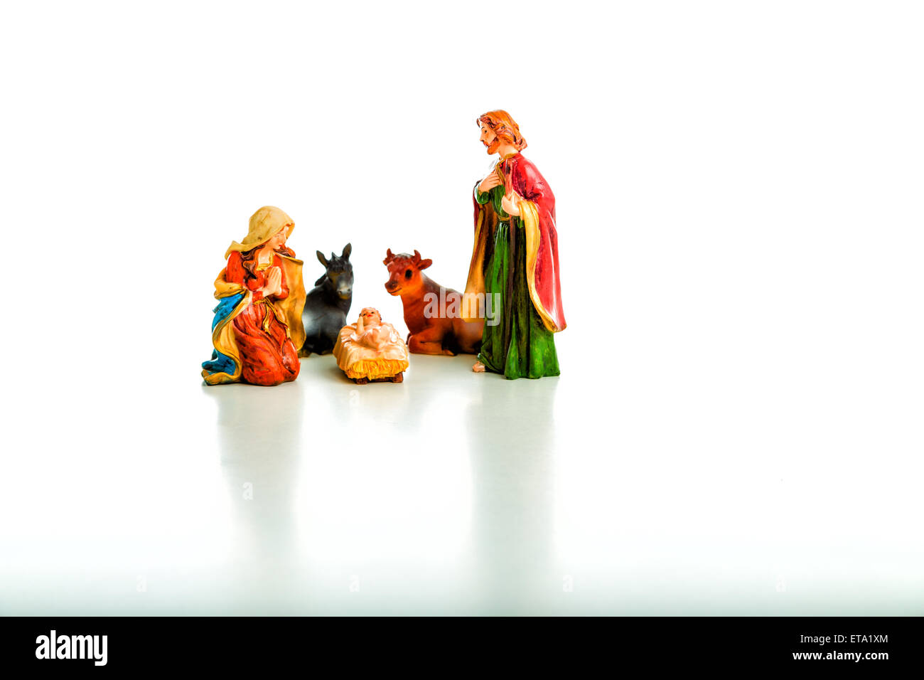 A simple Christmas Crib where the little statues represent the Holy ...