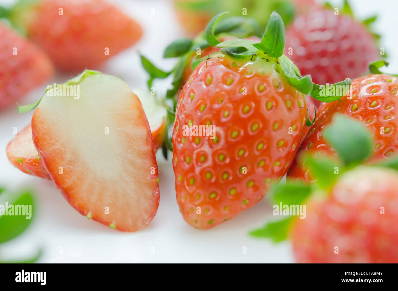 Red strawberry fruits green hi-res stock photography and images - Alamy