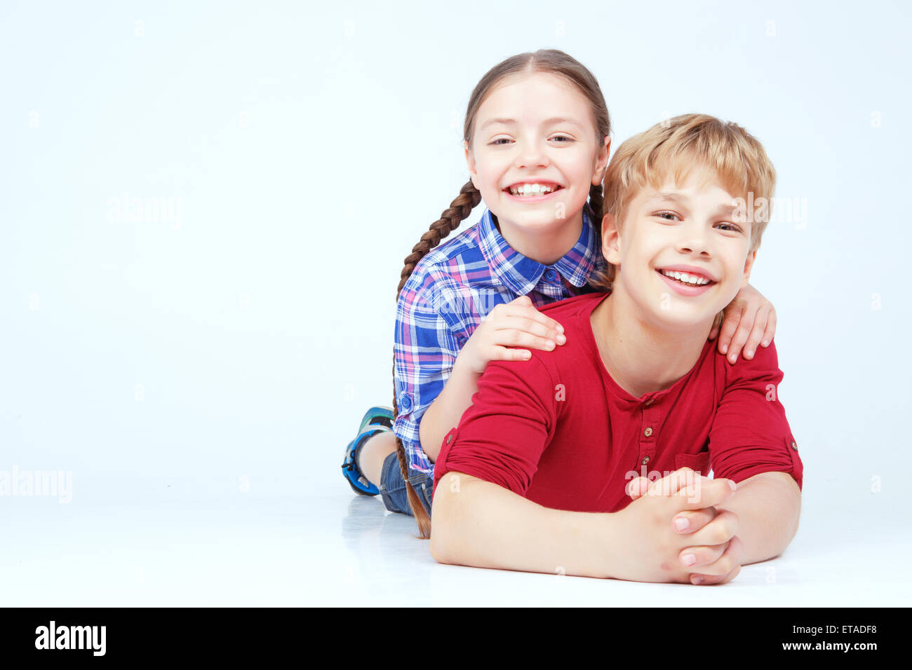 Children having fun on the floor Stock Photo - Alamy