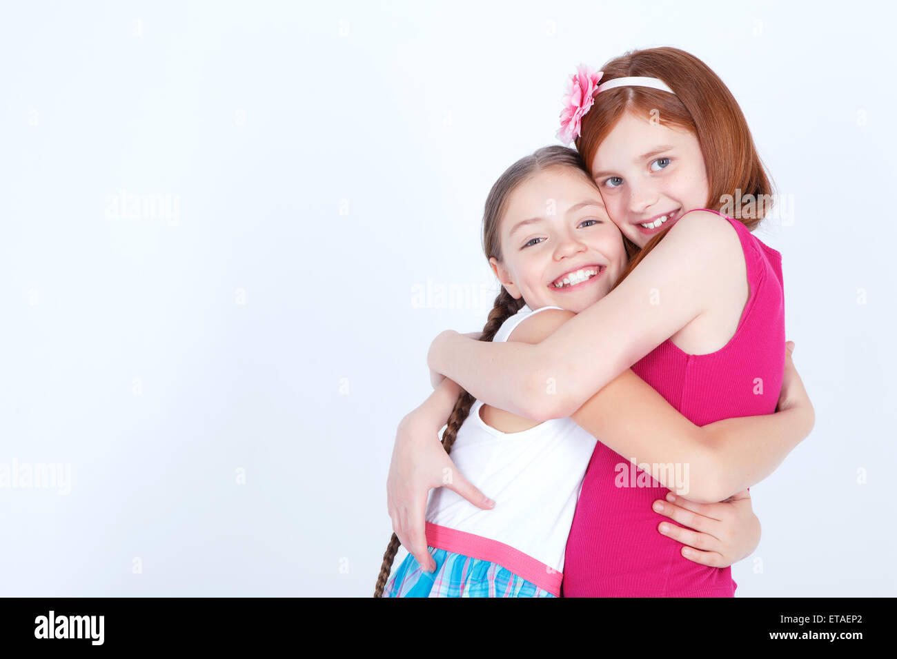 Nice girls standing together Stock Photo - Alamy