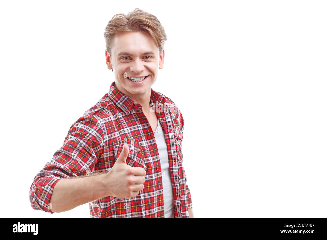 Young man thumbing up isolated on white background Stock Photo - Alamy
