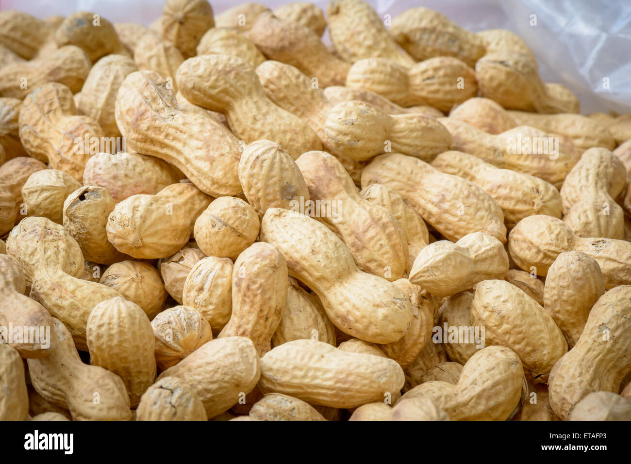 roasted peanuts in a sack at a village festival Stock Photo - Alamy