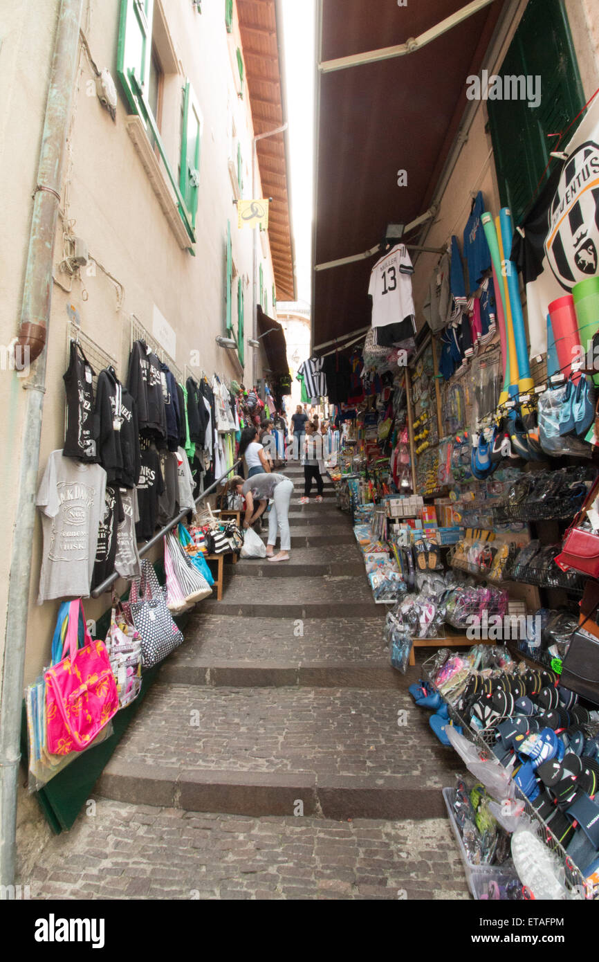 Italian street in Limone, with shops and shoppers Stock Photo - Alamy