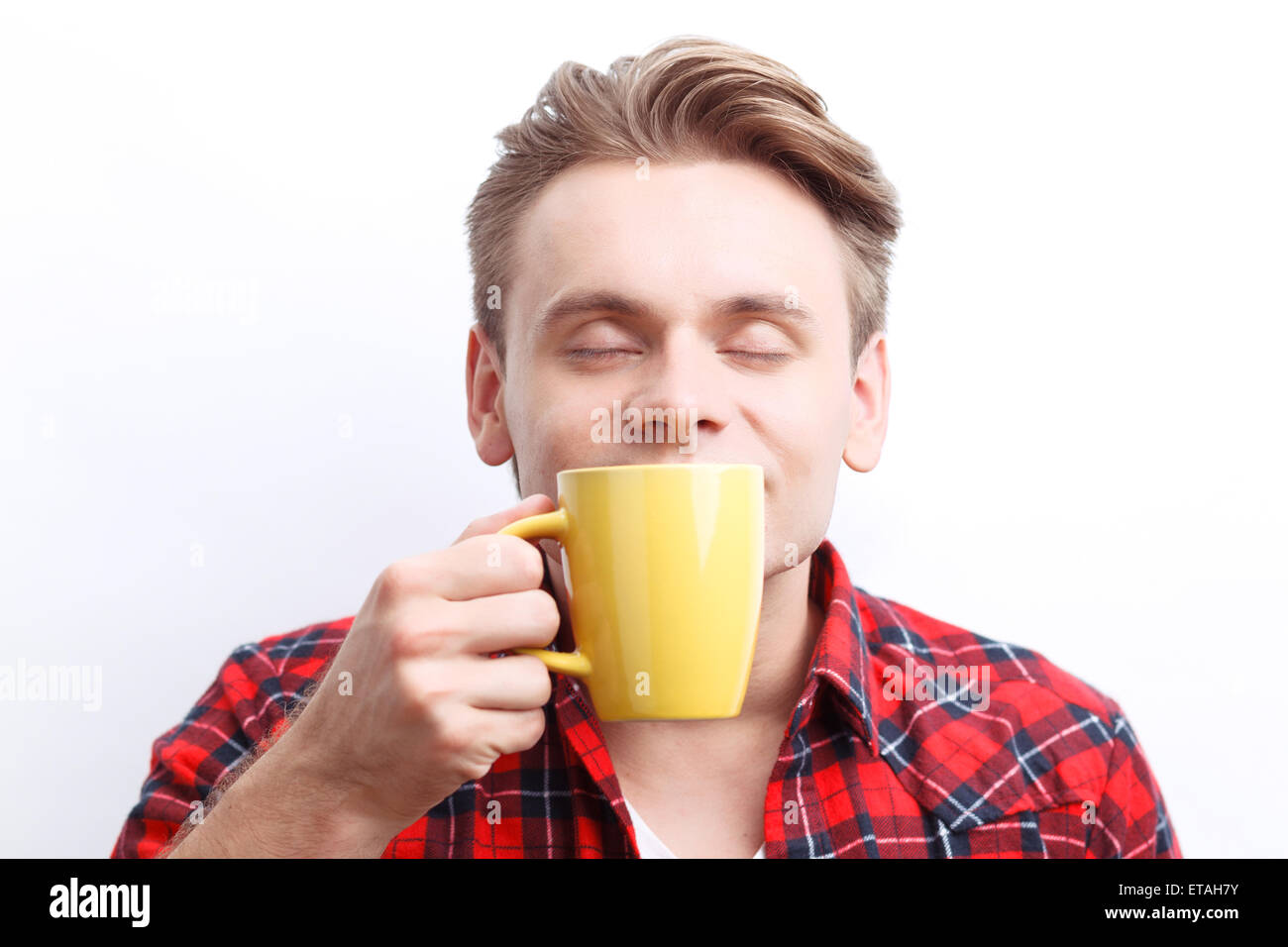 Nice guy smelling tea aroma Stock Photo - Alamy