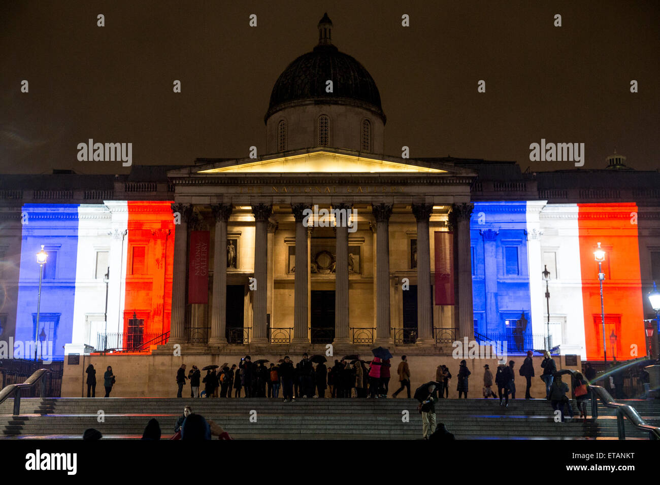 The National Gallery is illuminated with the Tricolor (French flag) in ...