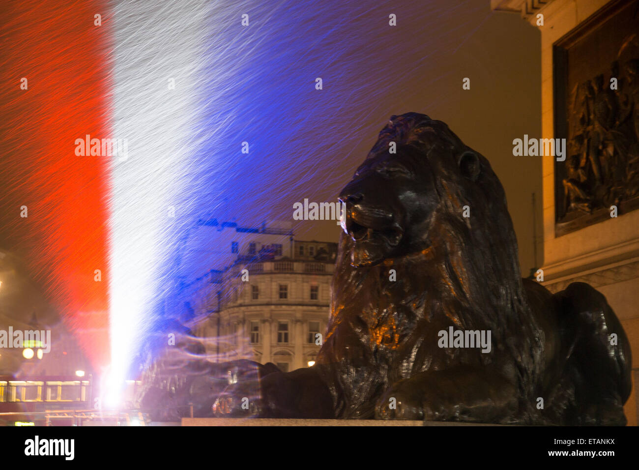 The National Gallery is illuminated with the Tricolor (French flag) in ...