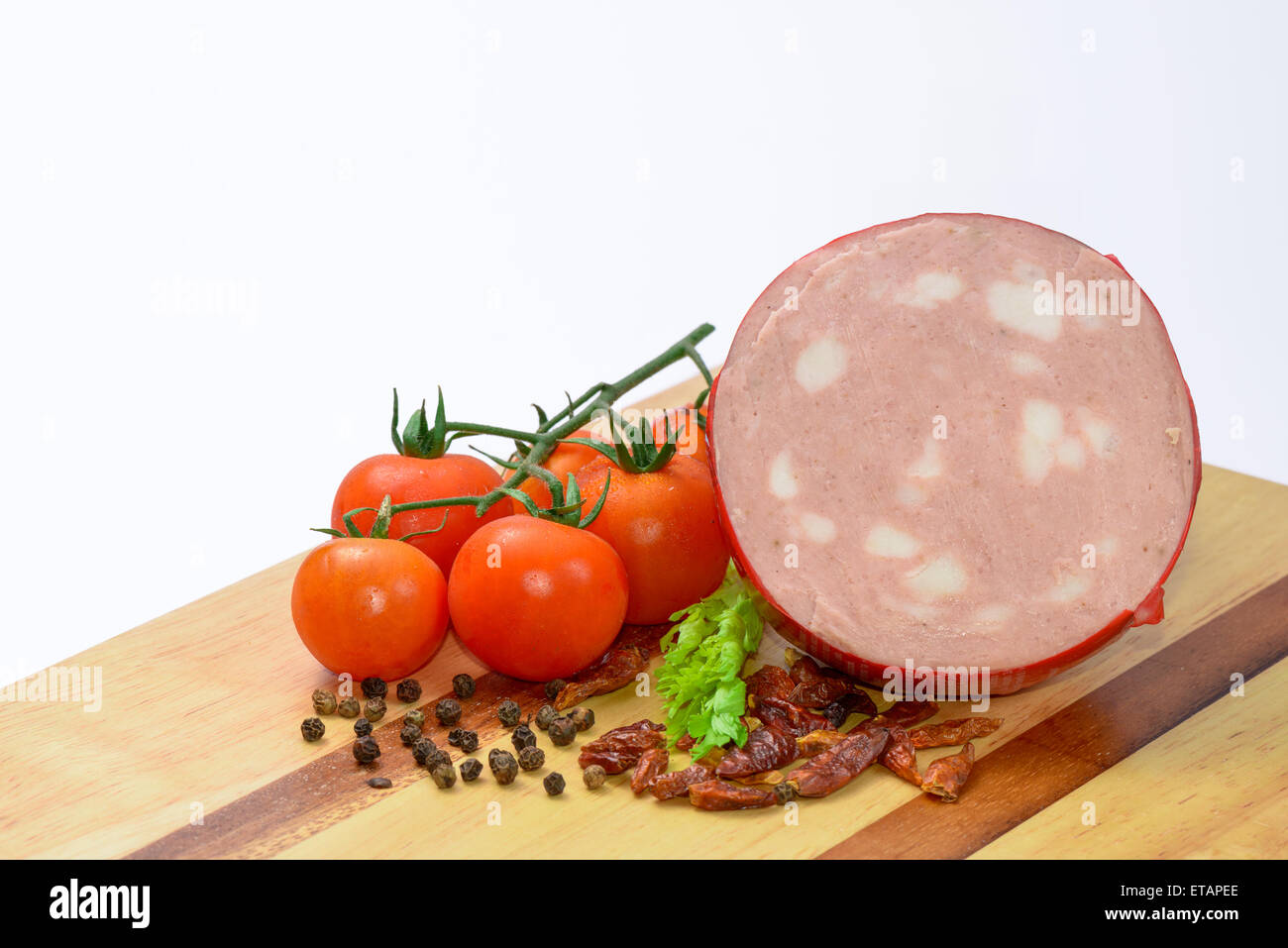 Italian Mortadella Bologna with tomatoes and vegetables Stock Photo - Alamy