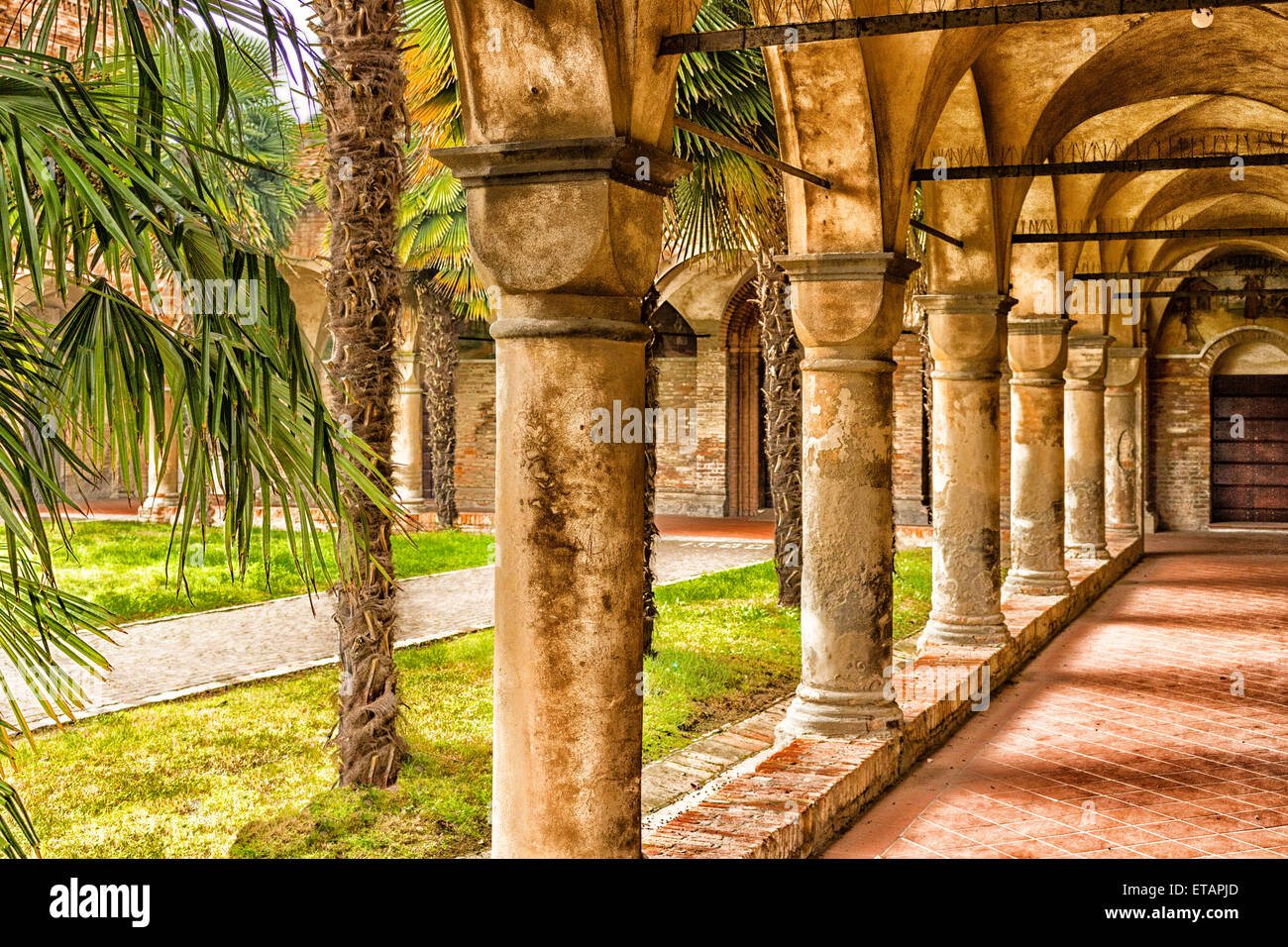 Colonnade and archs of cloister of the XV century roman gothic church ...