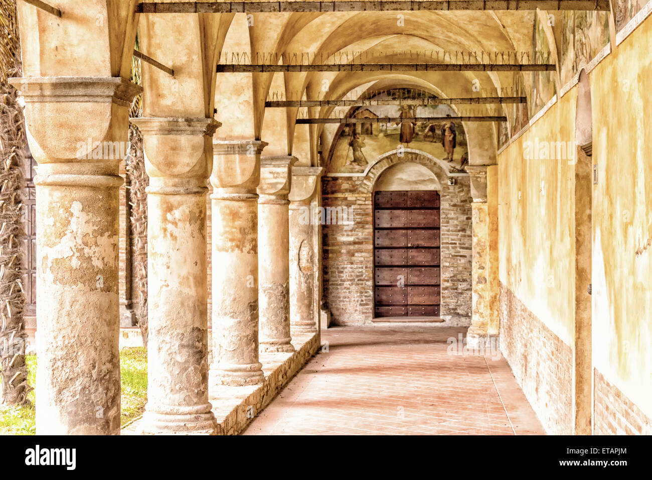 Colonnade and archs of cloister of the XV century roman gothic church ...