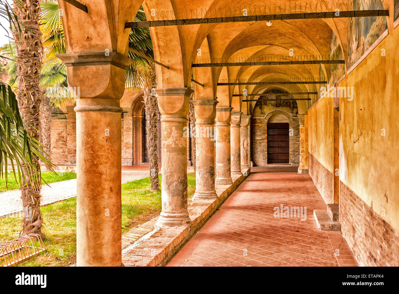 Colonnade and archs of cloister of the XV century roman gothic church ...