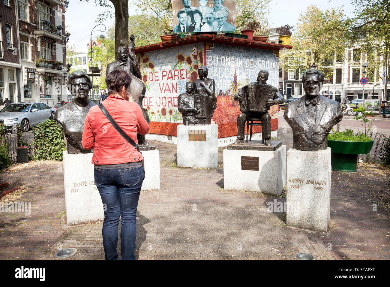 statues in bronze of famous artists from the Jordaan in dutch capital ...