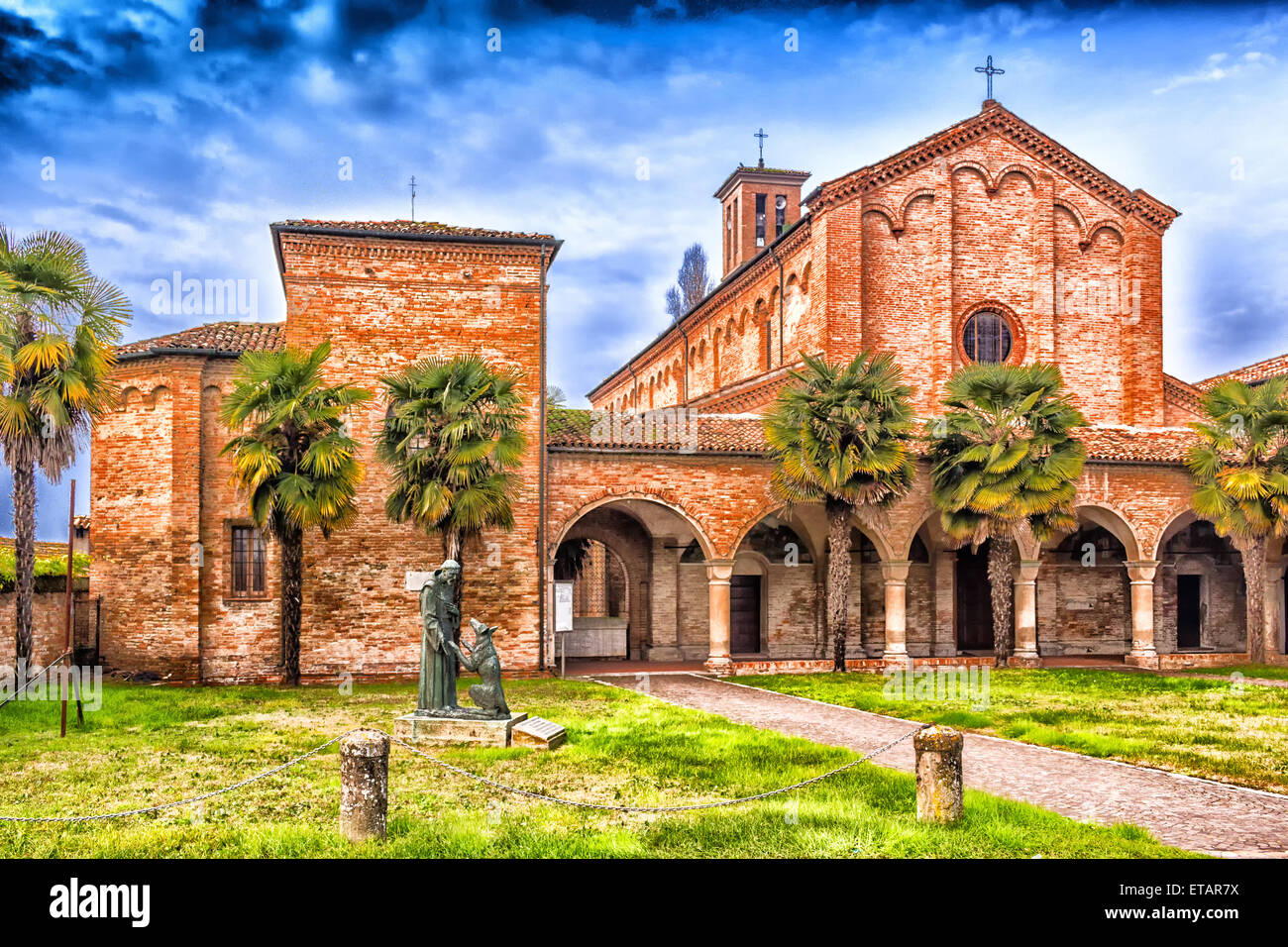 Brickwall facade and colonnade with archs of the XV century roman ...
