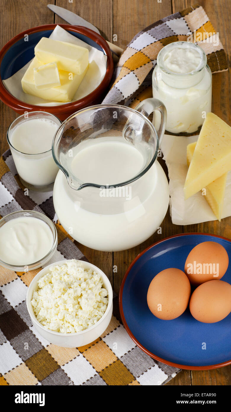 Fresh Milk products on wooden background.Top view Stock Photo - Alamy